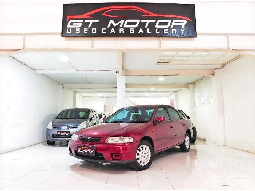 Jual Mobil Mazda 323 1999 1.8 di Jawa Barat Manual Sedan Marun Rp 55. ...